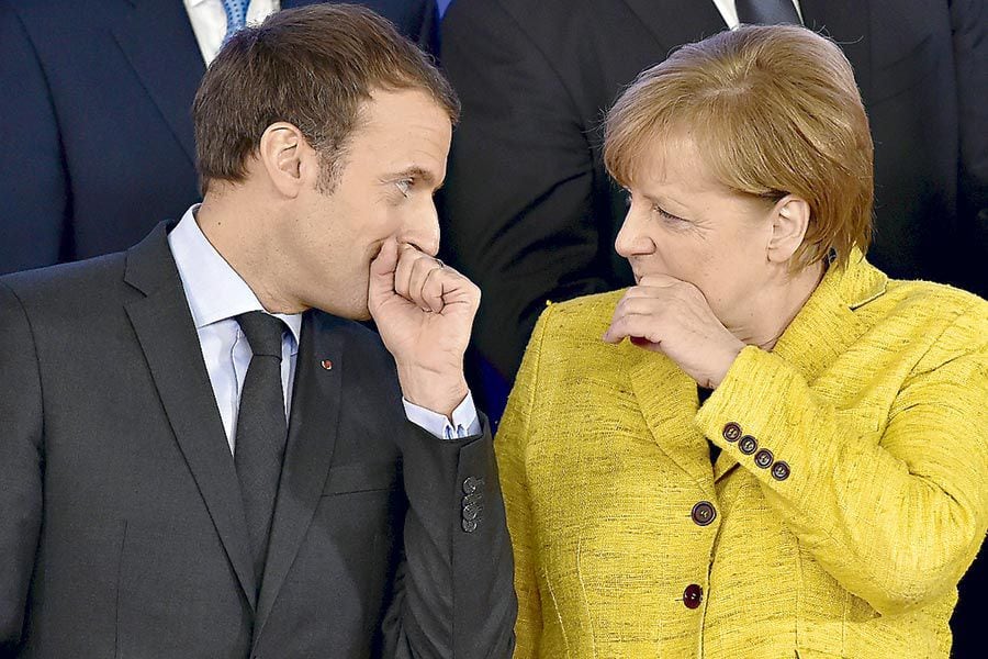 Merkel y Macron abordan voluntad reformista de la UE - La Tercera